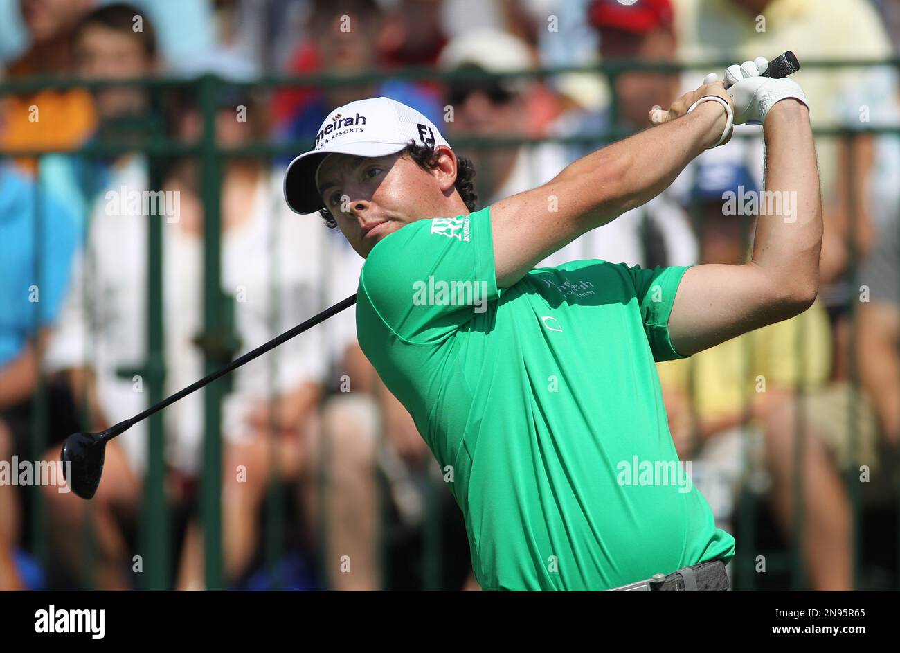 Rory McIlroy, from Northern Ireland, hits his tee shot on the first tee ...