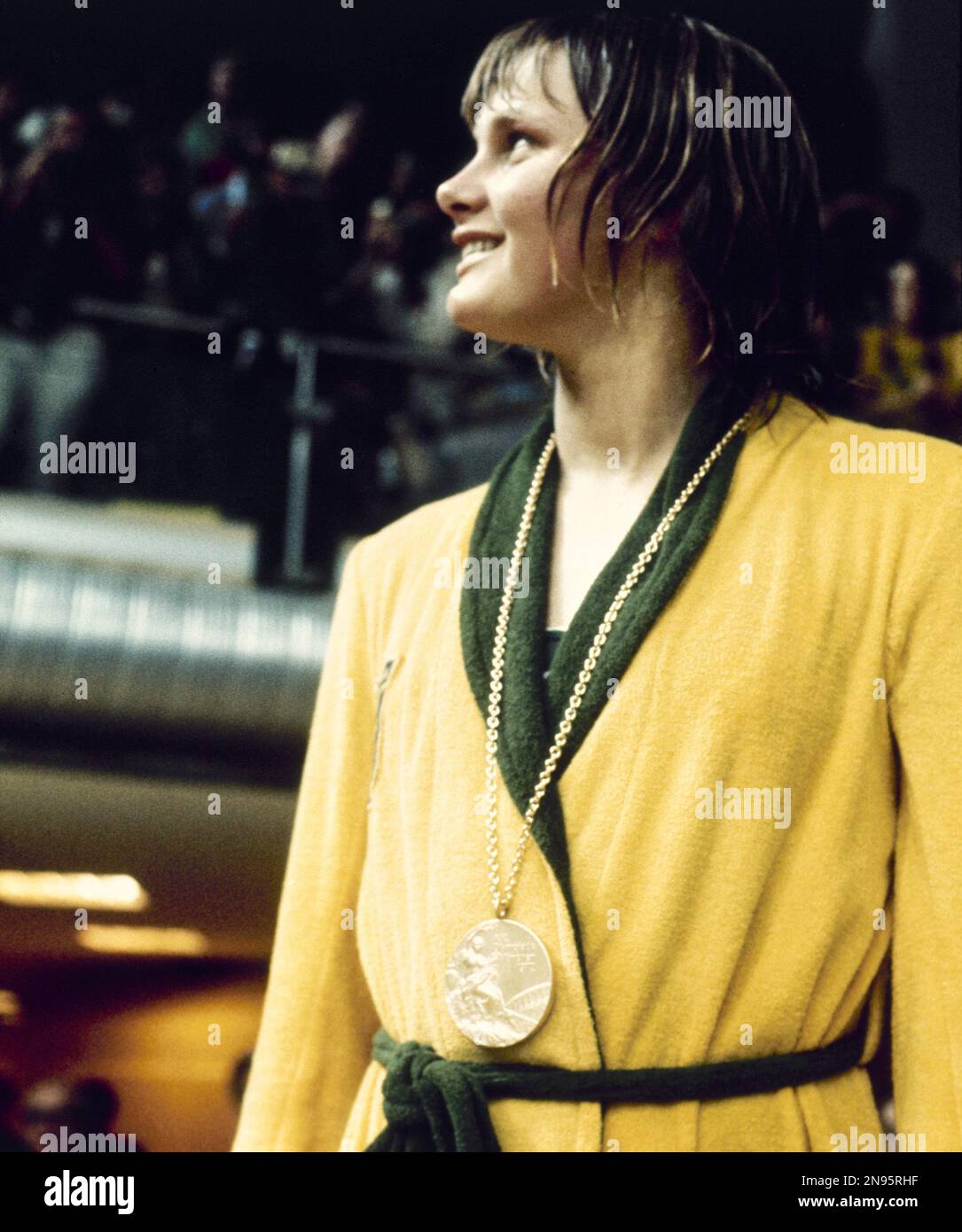 Shane Gould of Australia wears the gold medal she won on Wednesday ...