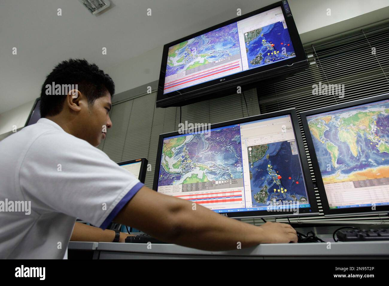 Filipino Engineer Ponzch Colleen Alcones watches the Automatic ...