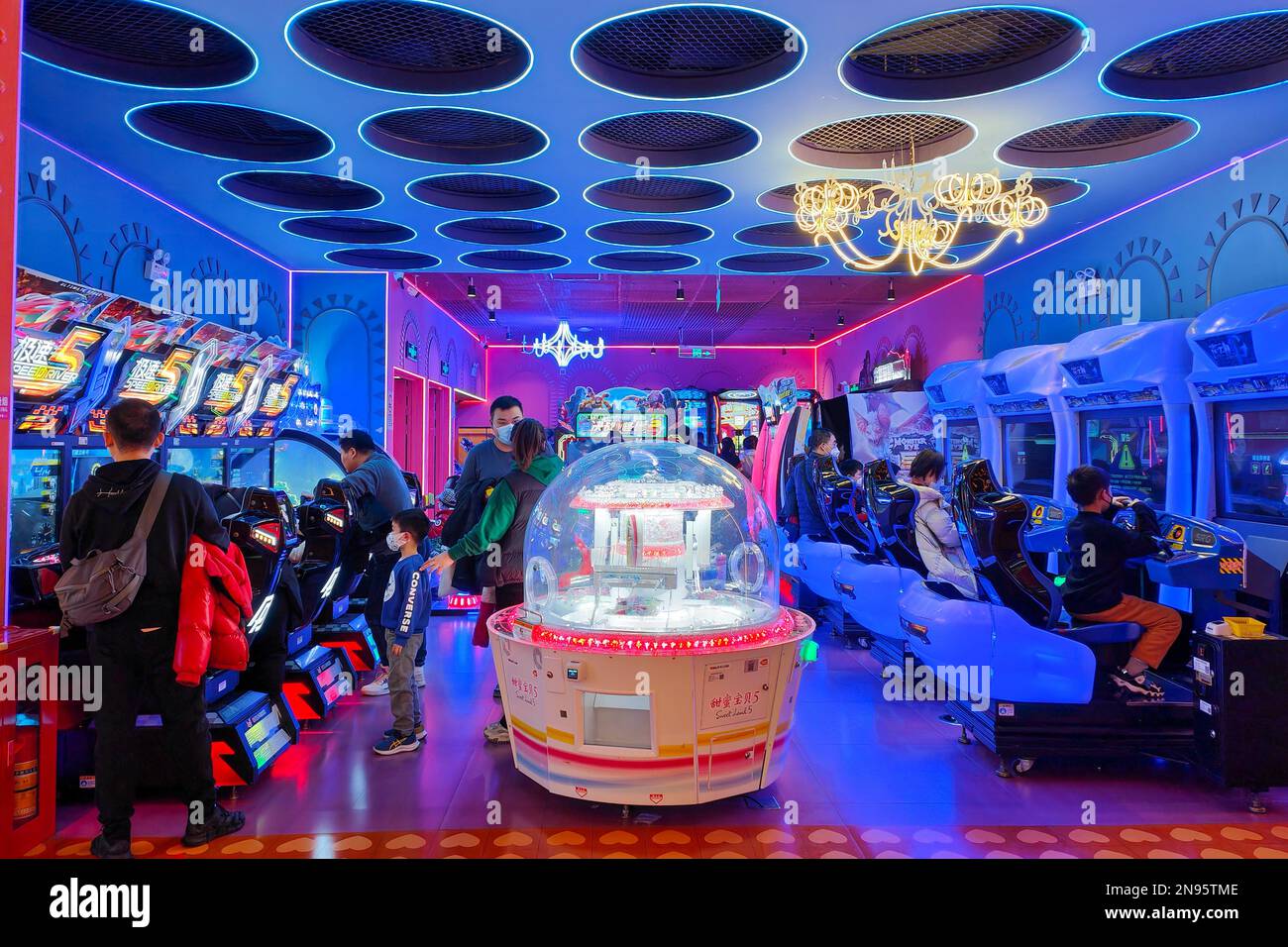 SHANGHAI, CHINA - FEBRUARY 11, 2023 - Parents play games with their ...