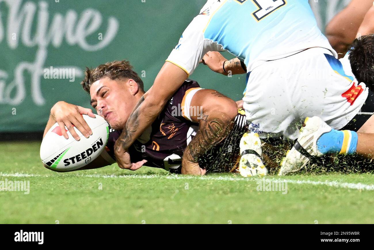 Reece Walsh (left) of the Broncos scores a try during the NRL (National ...