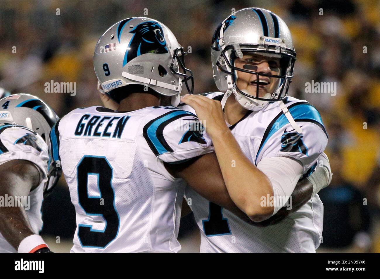 Carolina Panthers wide receiver Jared Green (9) hugs quarterback Jimmy ...