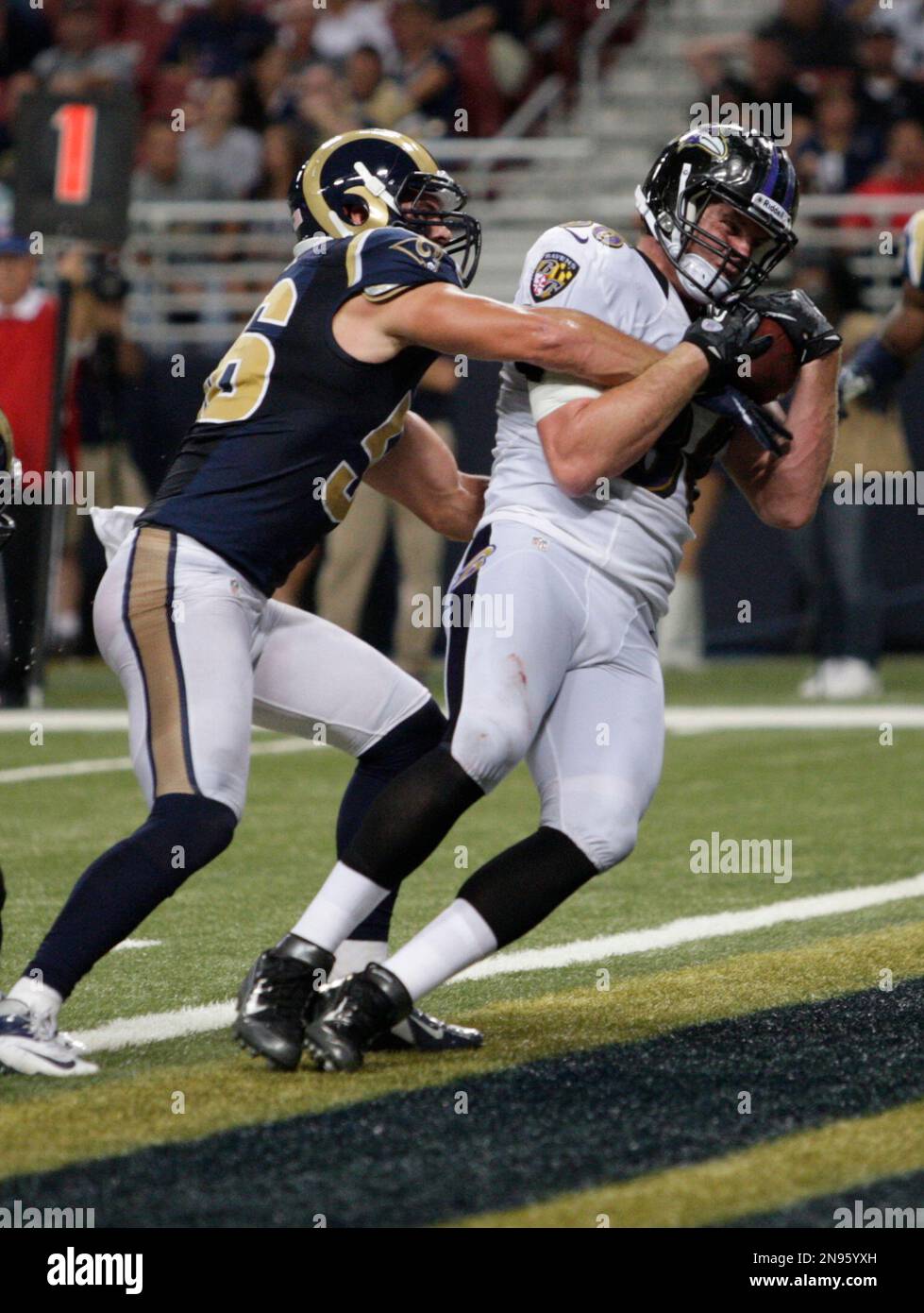 Baltimore Ravens tight end Billy Bajema, right, catches a 7-yard ...