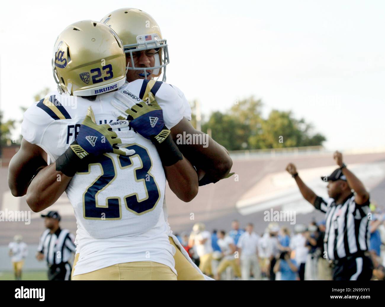 UCLA running back Johnathan Franklin (23) celebrates with wide receiver ...