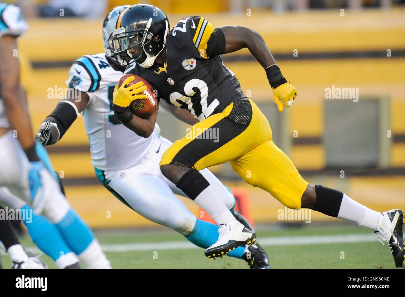 Pittsburgh Steelers running back Chris Rainey (22) runs past Carolina ...