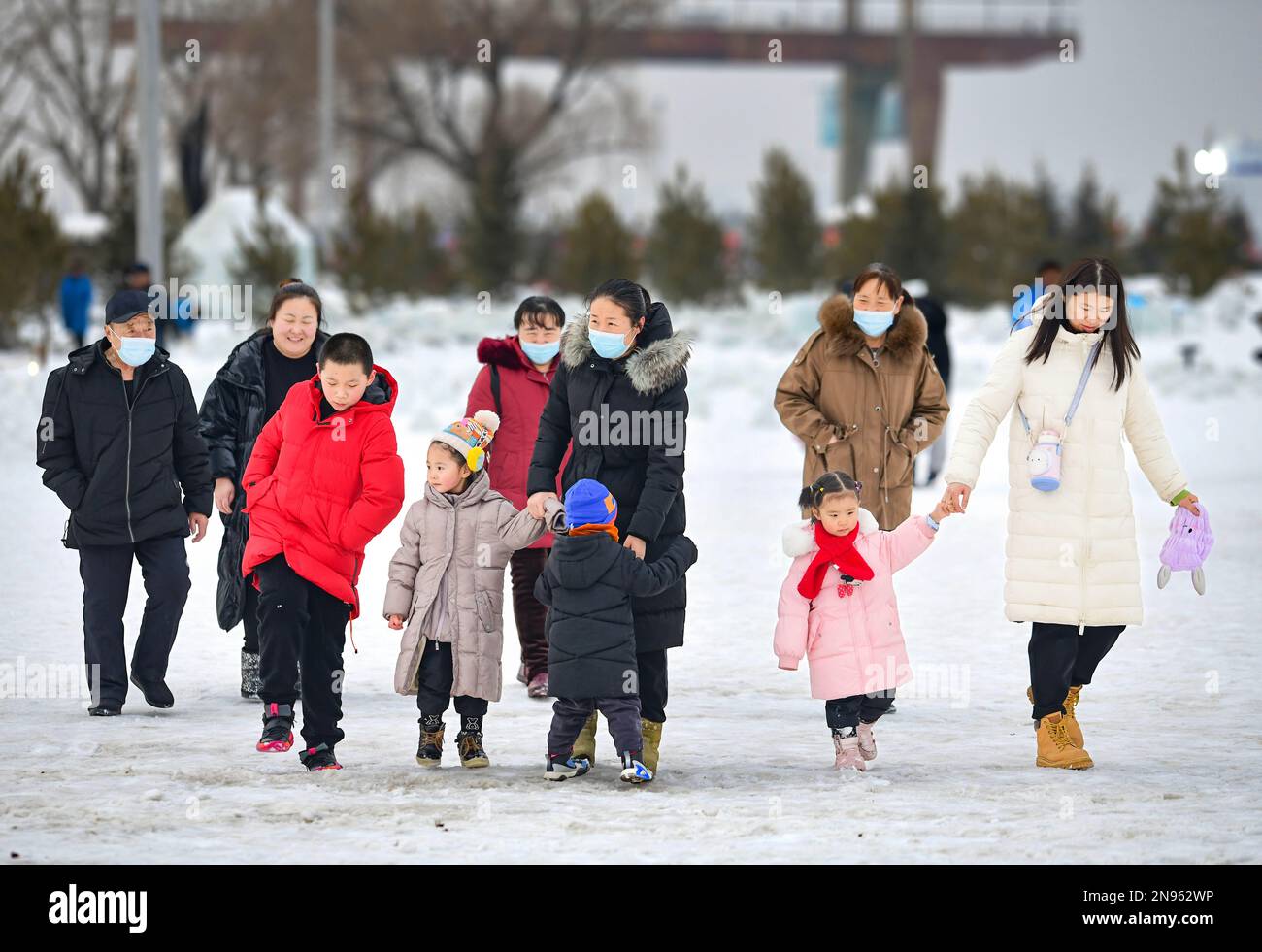 HOHHOT, CHINA - FEBRUARY 12, 2023 - Tourists walk at the Ice and Snow ...