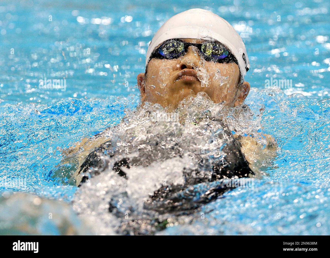 China's Lu Dong competes in the women's 100m Backstroke S6 category at ...