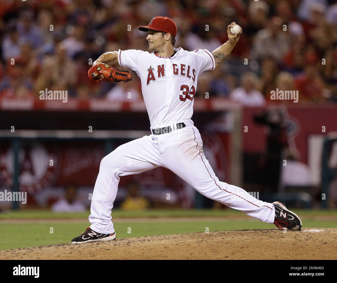 Los Angeles Angels starting pitcher C.J. Wilson throws to the Boston ...
