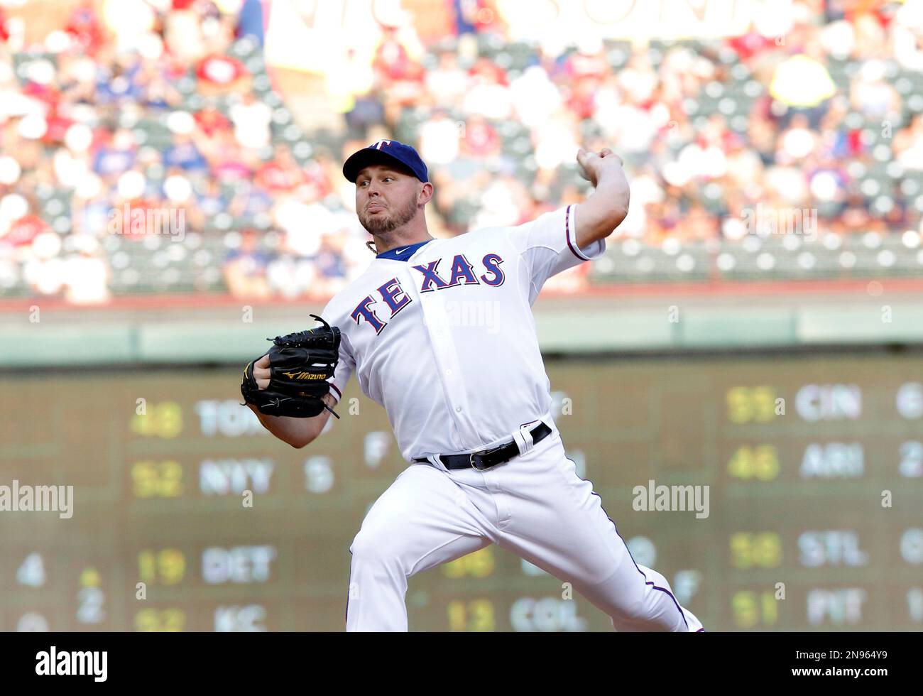 Texas Rangers pitcher Matt Harrison throws against the Tampa Bay Rays ...