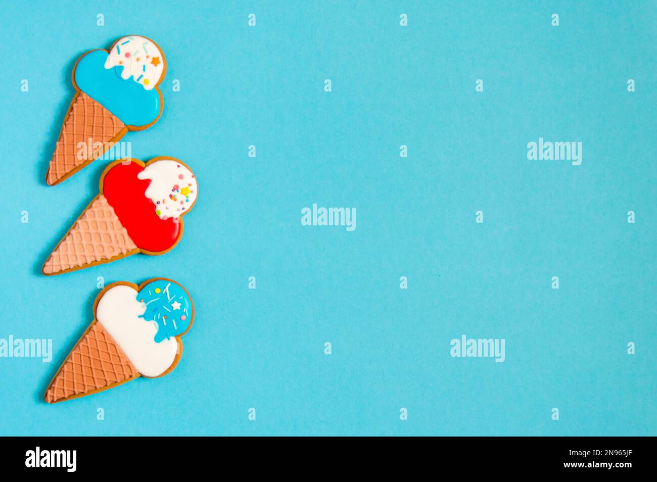 gingerbread on a blue background flatly Stock Photo - Alamy