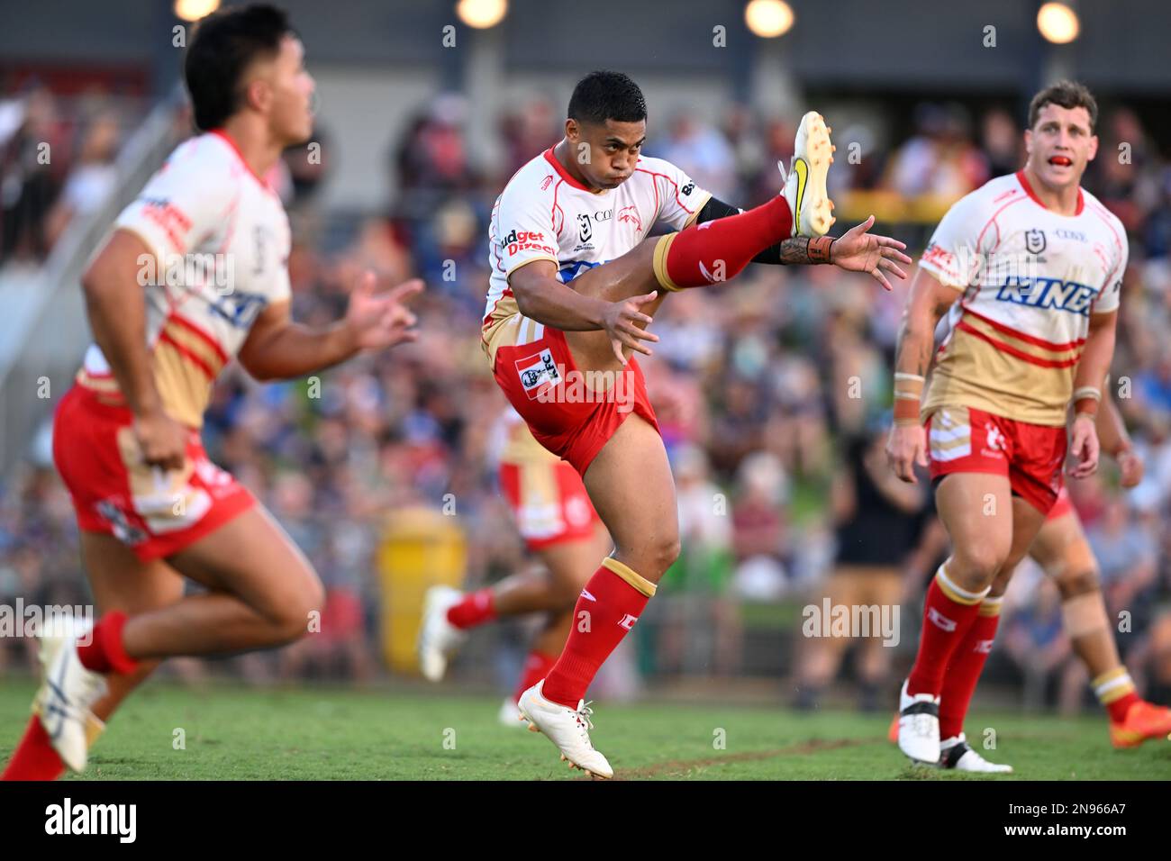 Anthony Milford of the Dolphins kicks during the NRL Pre-Season ...