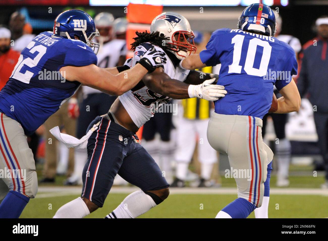 New England Patriots linebacker Jermaine Cunningham (96) beats New ...