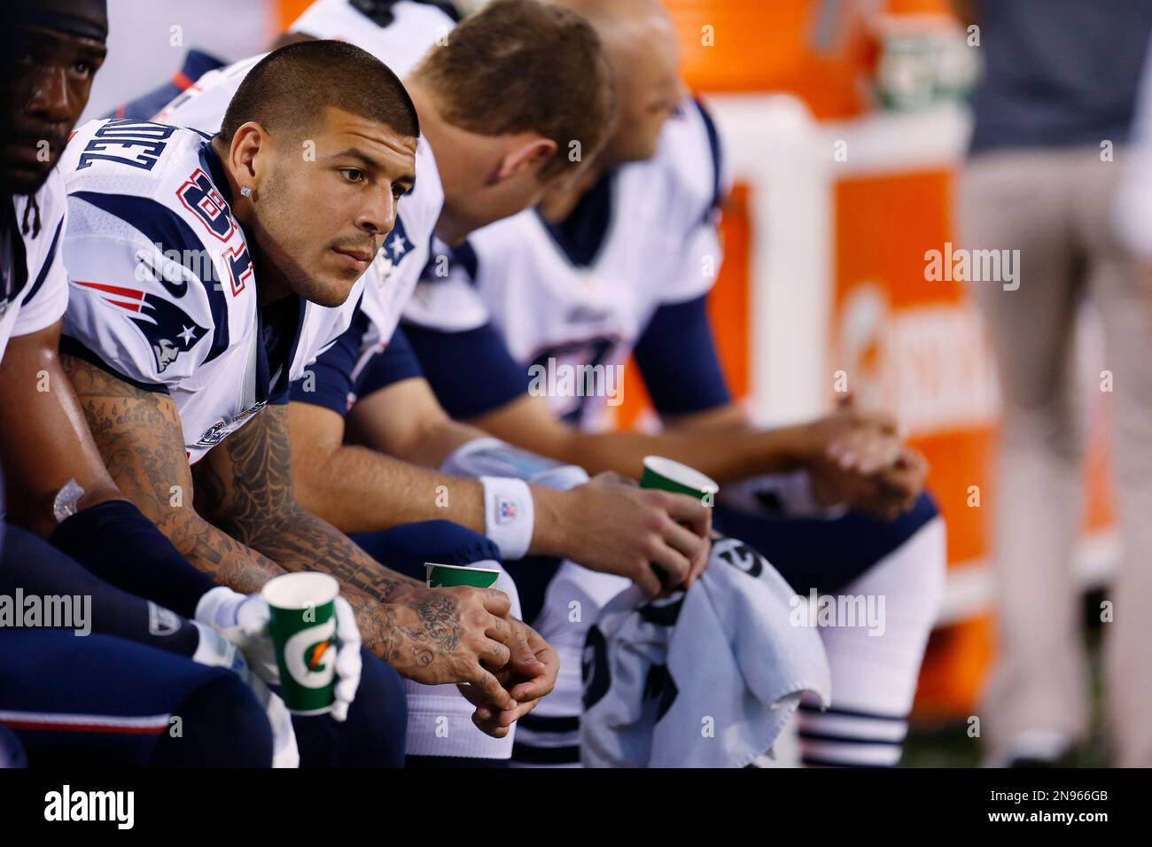 New England Patriots tight end Aaron Hernandez (81) watches during the ...