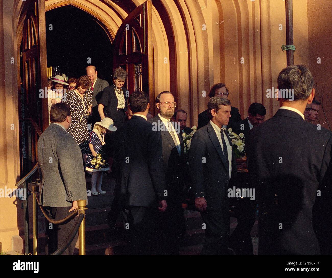 The Atwater family walk behind the casket of Lee Atwater as they leave ...