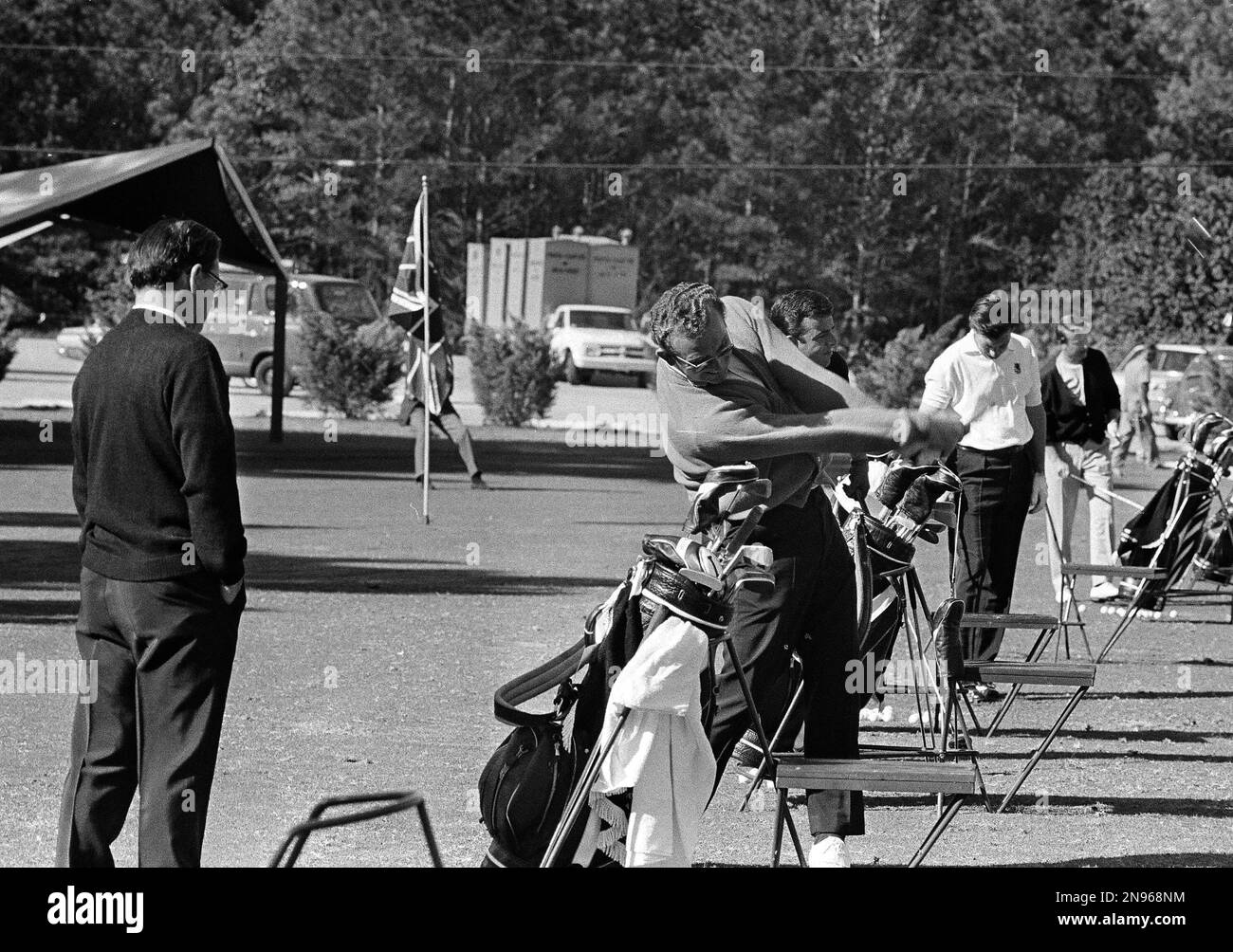 Members of the British Ryder Cup team practice under the eye of their ...