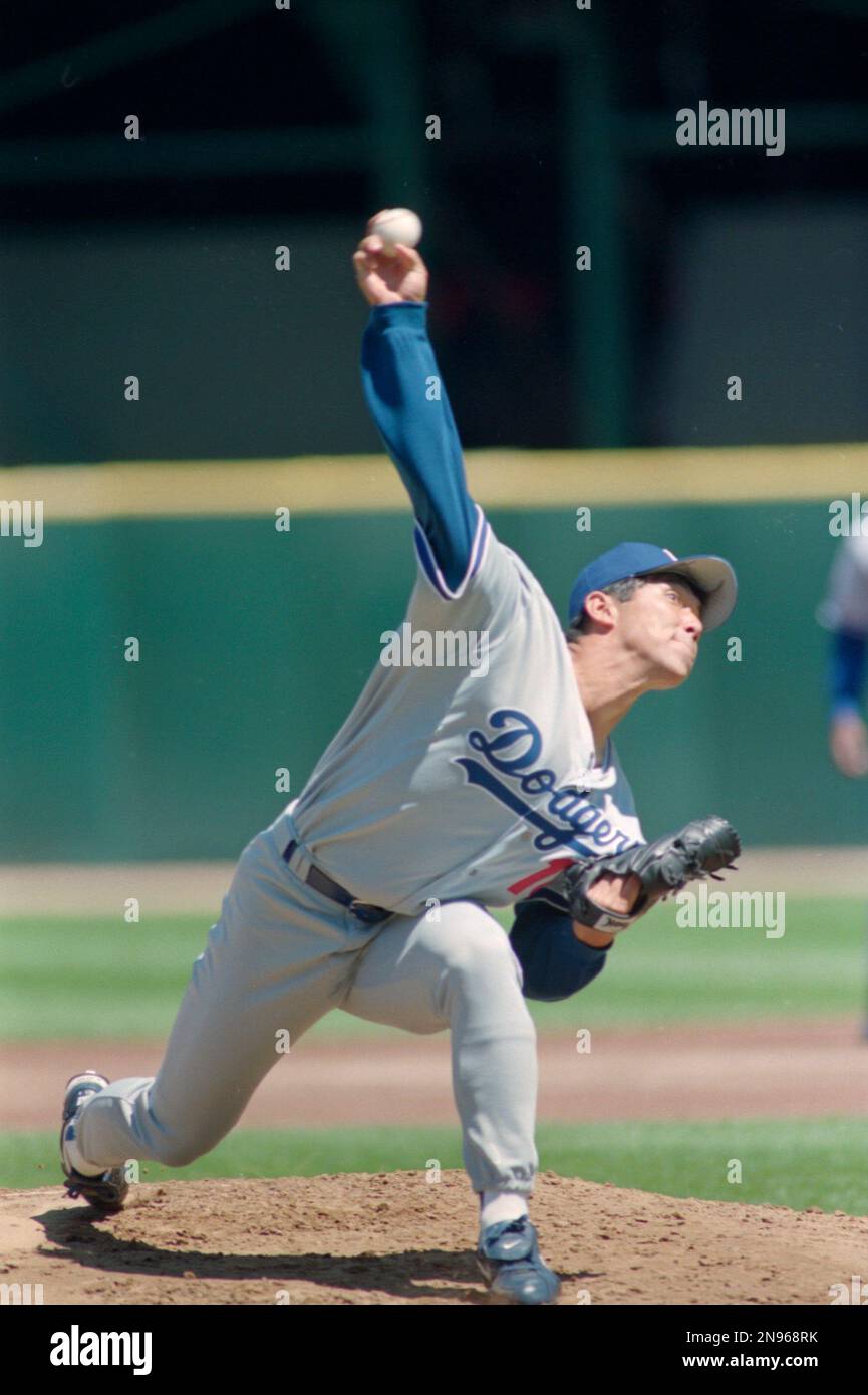 Los Angeles Dodgers pitcher Hideo Nomo pitches during a game against ...