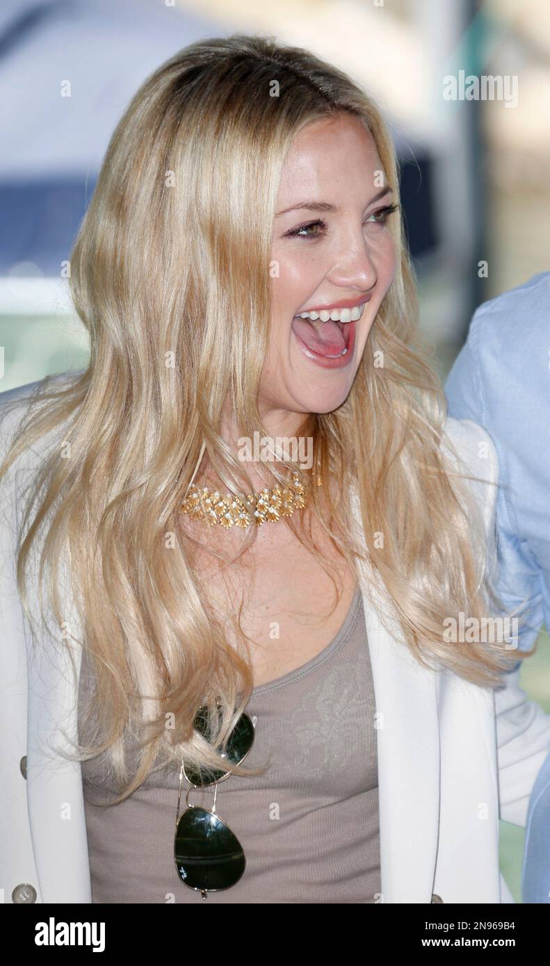 Actress Kate Hudson poses for photographers as she arrives for the ...