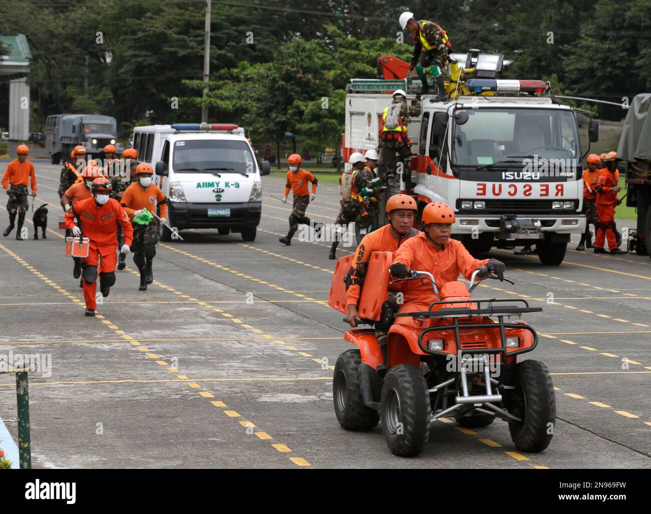 Philippine Army's rescue unit, some using an all-terrain vehicle ...