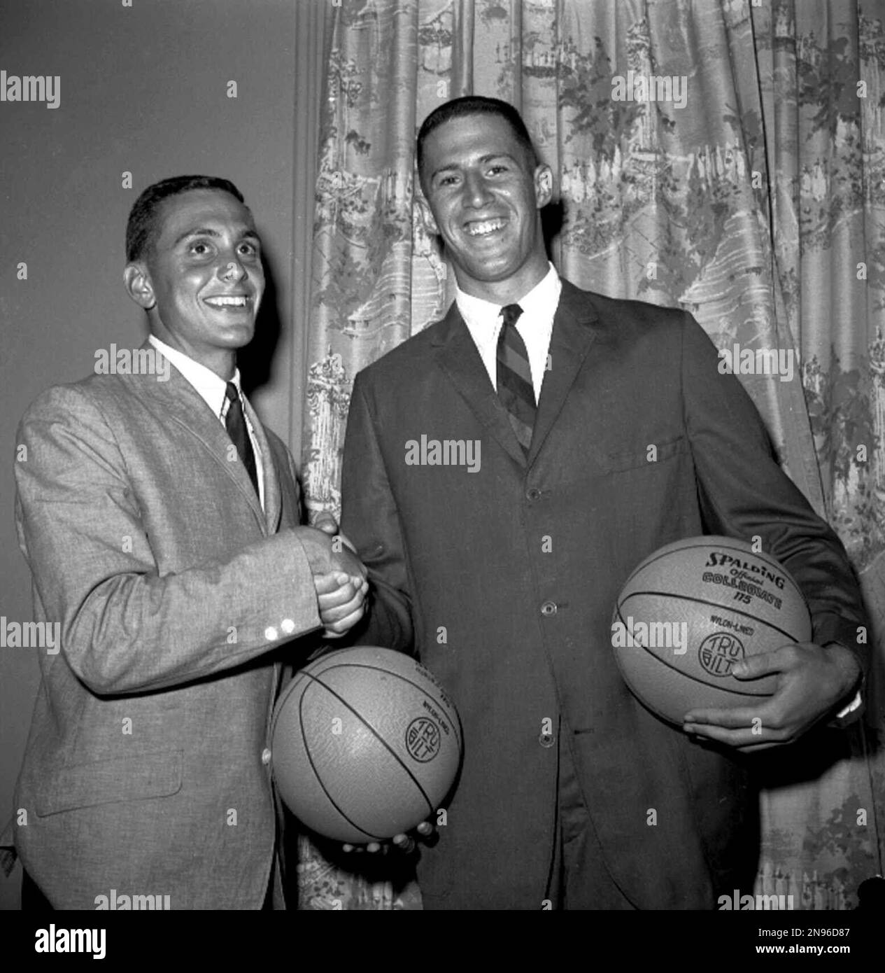 In this Aug. 16, 1961 file photo, basketball players Larry Brown, left ...