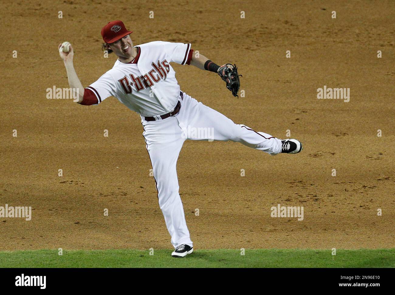 Arizona Diamondbacks' Jacob Elmore throws the ball to first base during ...