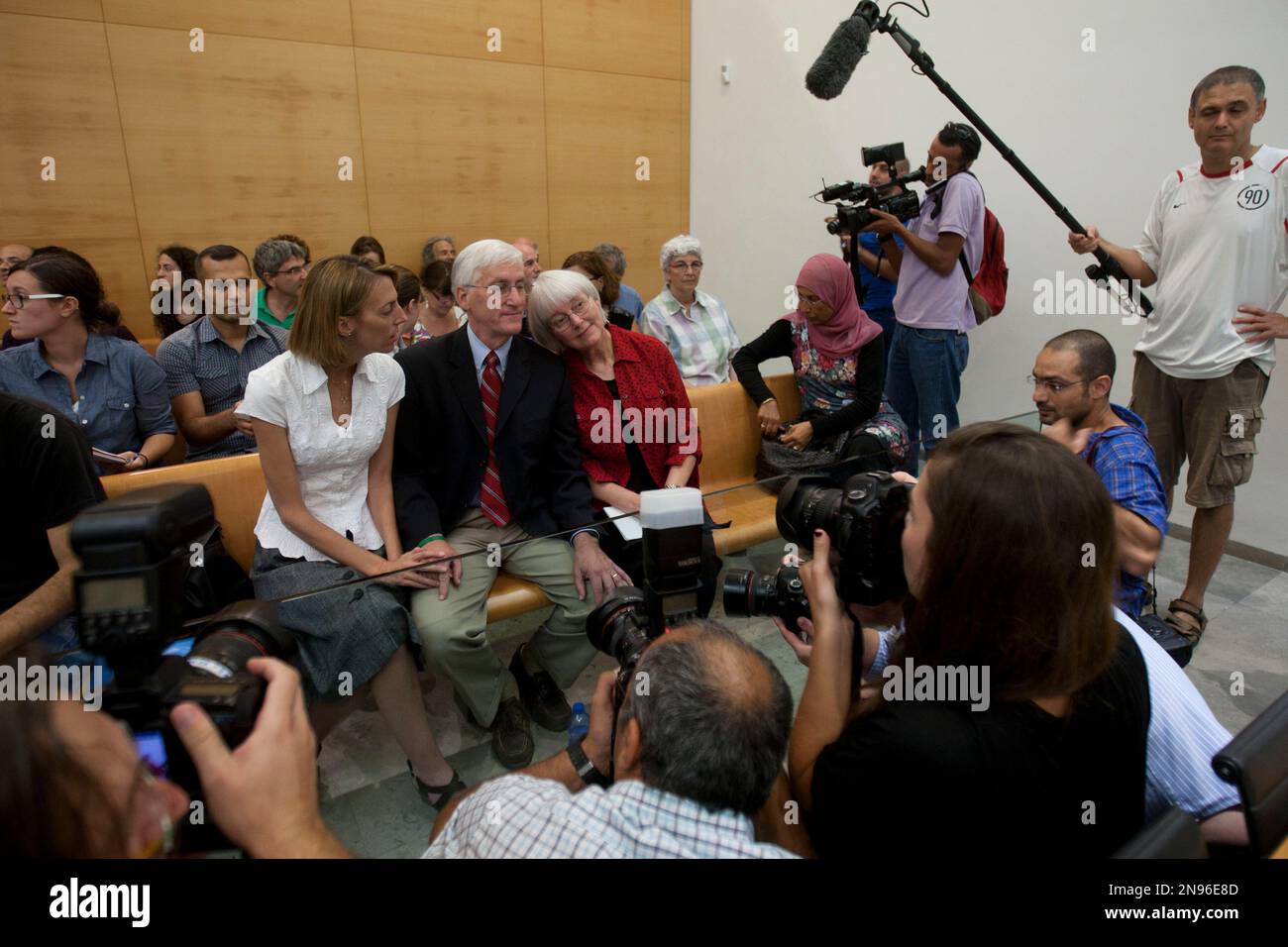 Cindy, center right, and Craig Corrie, center, the parents of Rachel ...