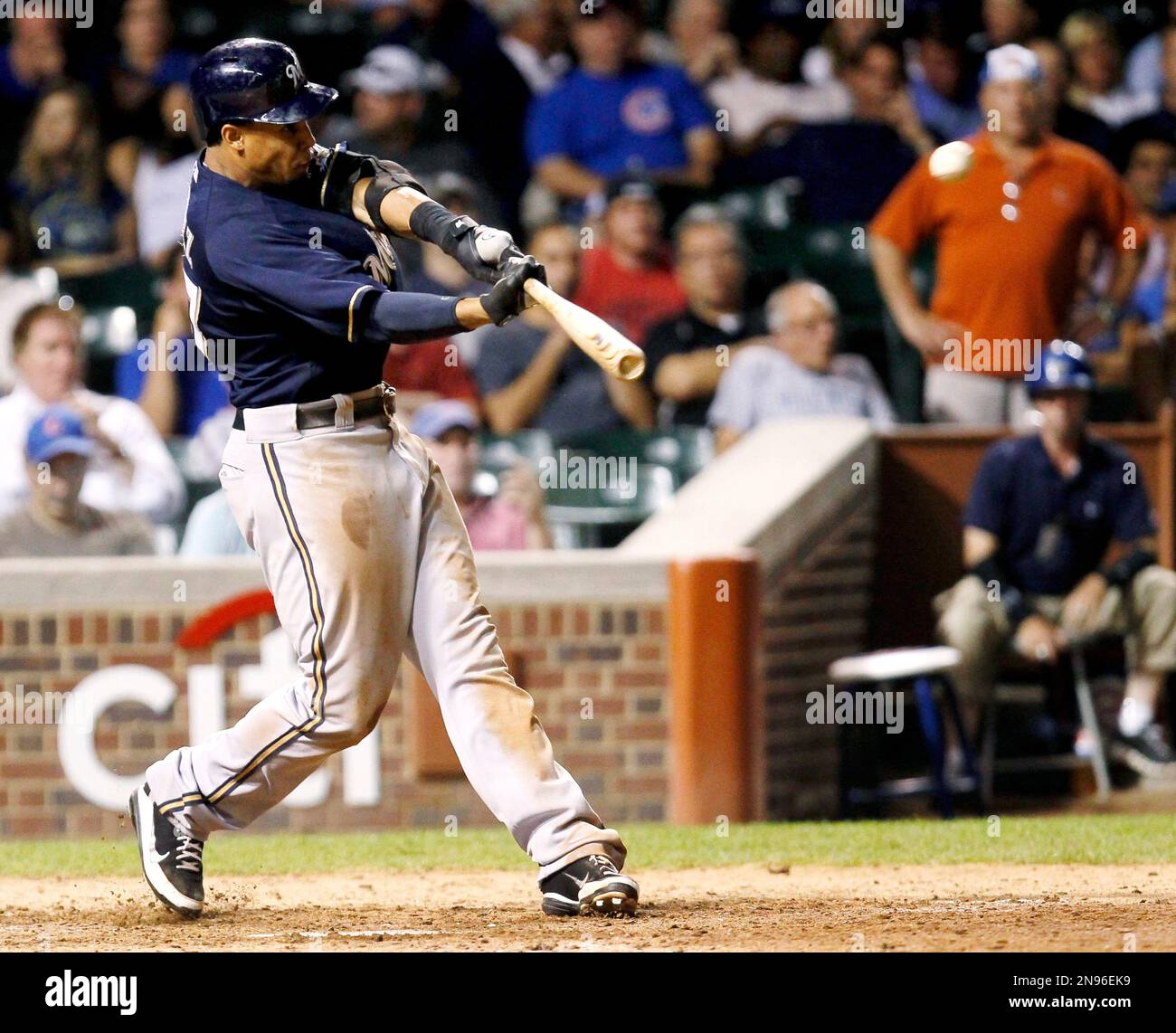 Milwaukee Brewers' Carlos Gomez hits a home run off Chicago Cubs relief ...