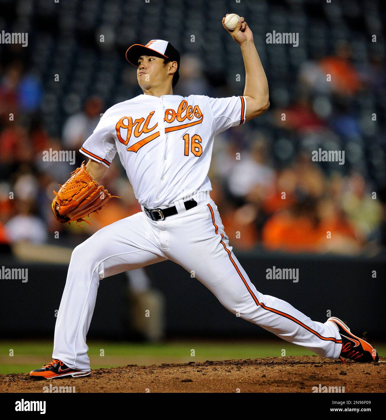 Baltimore Orioles starting pitcher Wei-Yin Chen, of Taiwan, delivers ...
