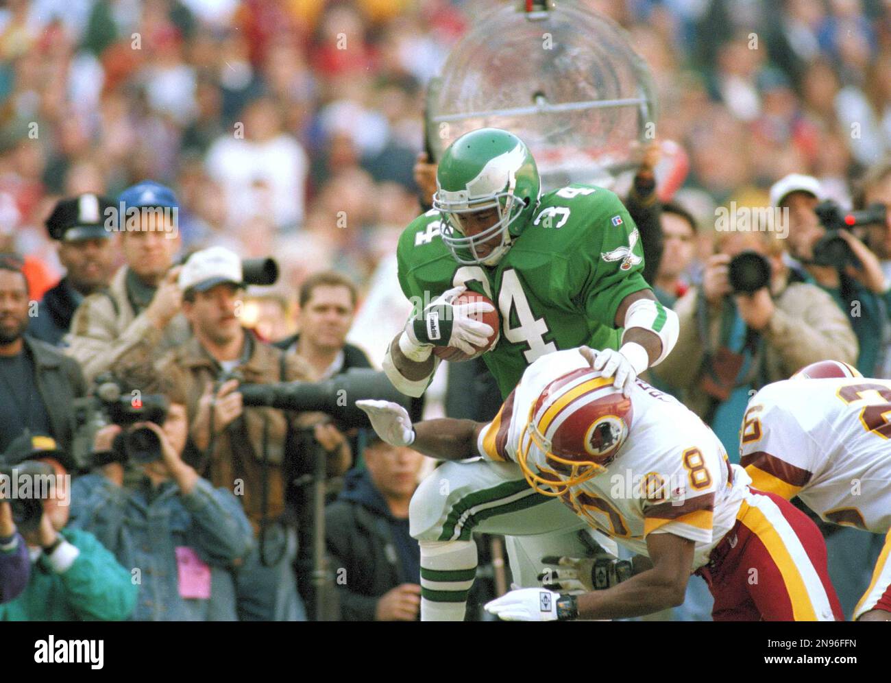 Philadelphia Eagles' running back Herschel Walker (34) is tackled by ...