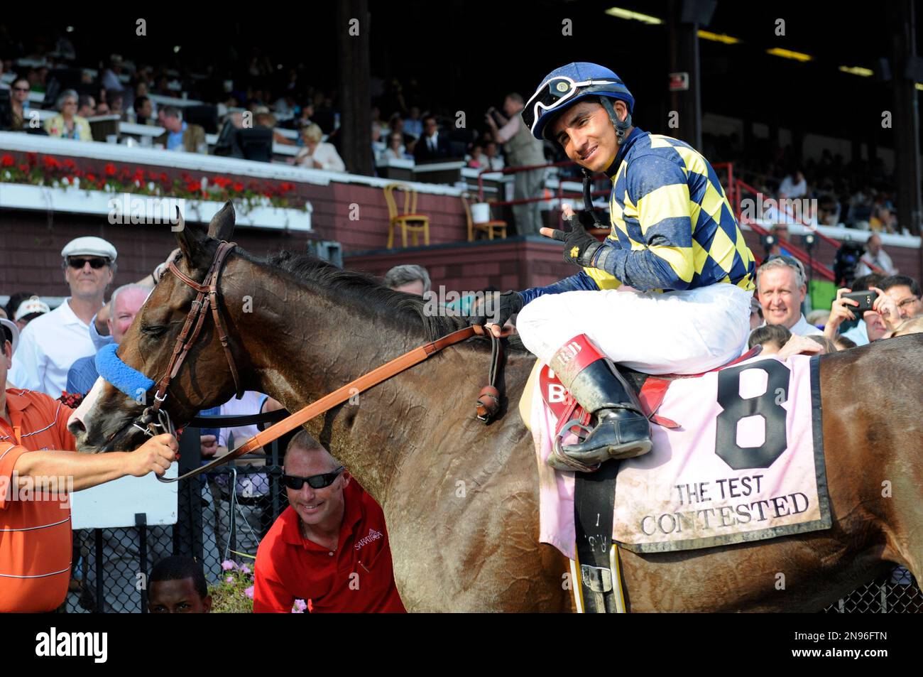 Contested with jockey Rafael Bejarano in the winner's circle after the ...