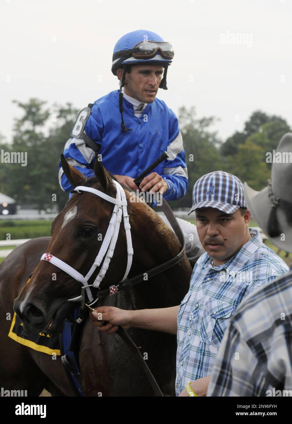 Alpha with Jockey Ramon Dominguez after finishing in a dead heat with ...