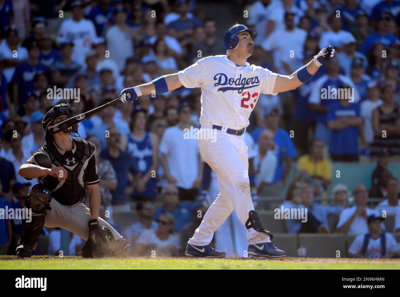 Los Angeles Dodgers' Adrian Gonzalez, right, flies out to right as ...