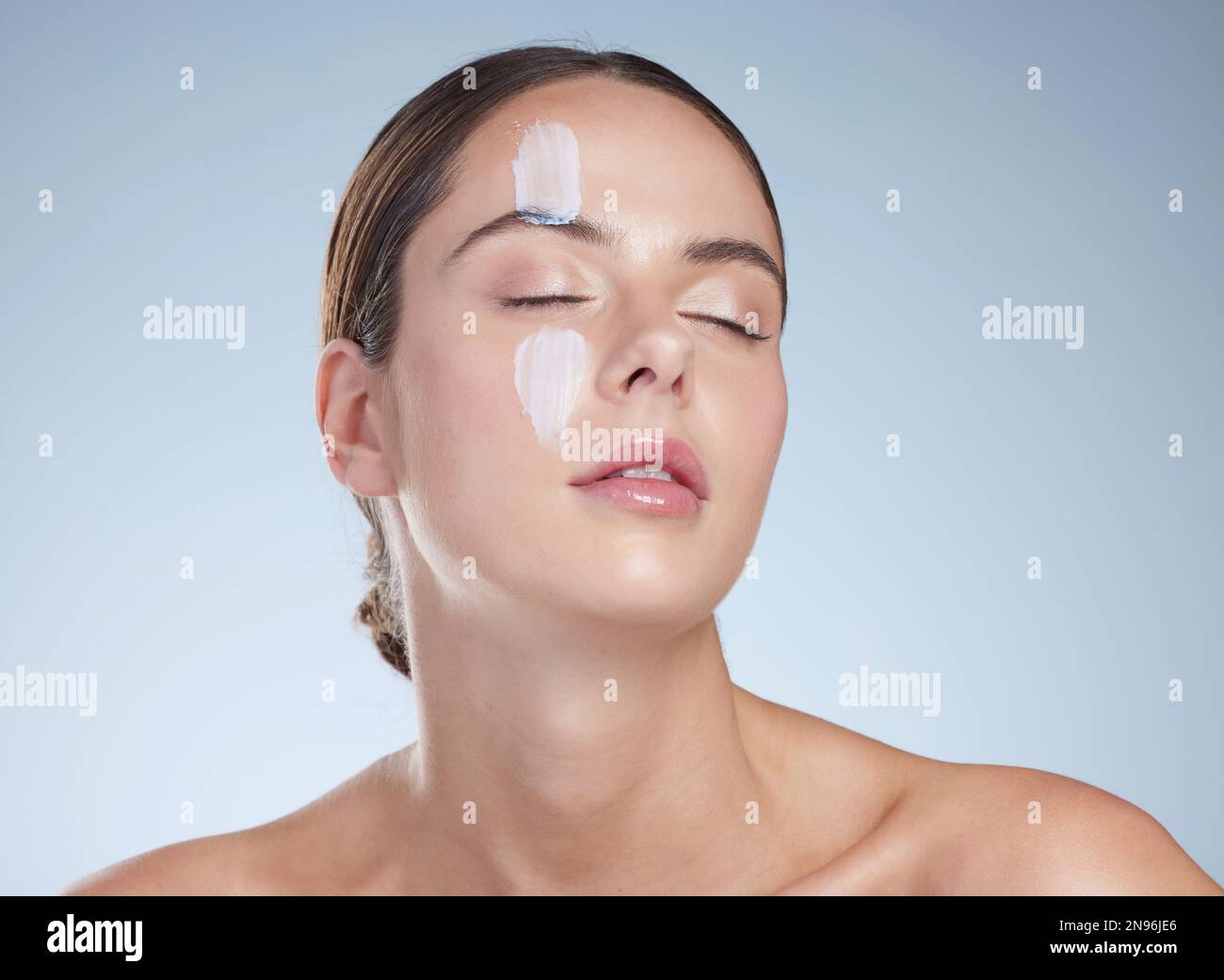 Great skin is all about consistency. Studio shot of an attractive young ...