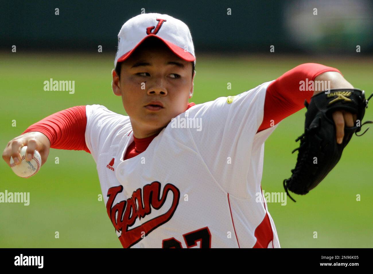 Tokyo pitcher Kotaro Kiyomiya delivers during the first inning of the ...