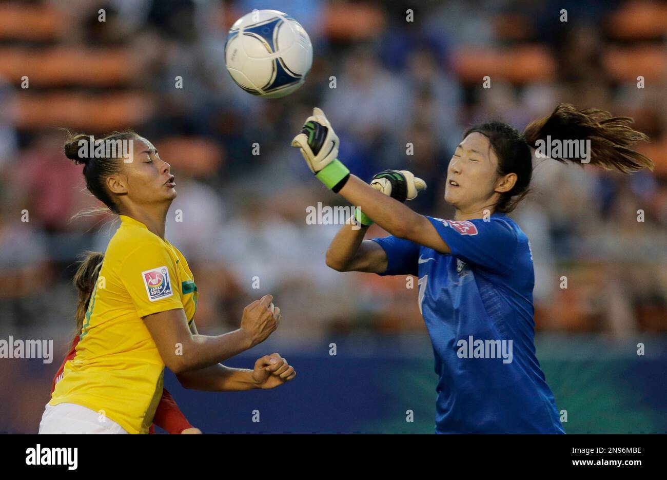 South Korea's goalkeeper Jeon Ha-neul, right, makes a save in front of ...