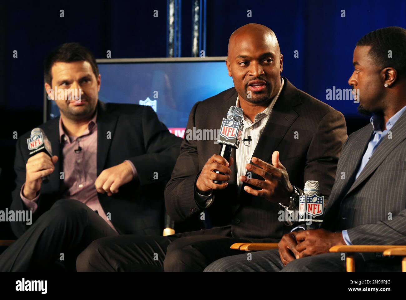 (left to right) Dave Dameshek, former NFL wide receiver Amani Toomer ...