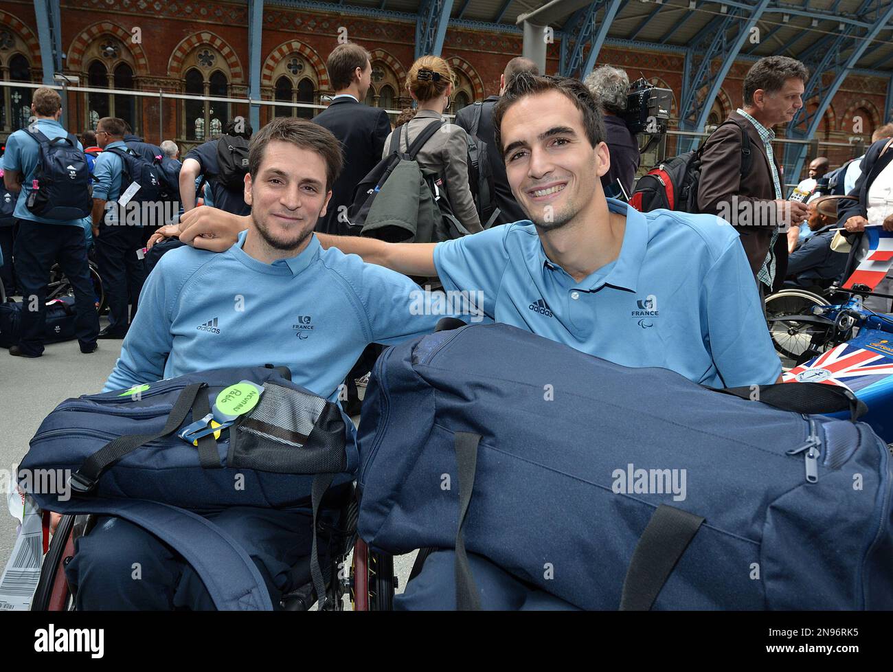The French Paralympic team arrives at the Eurostar terminal at London ...