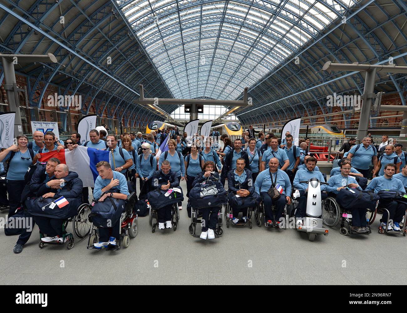 The French Paralympic team arrives at the Eurostar terminal at London ...