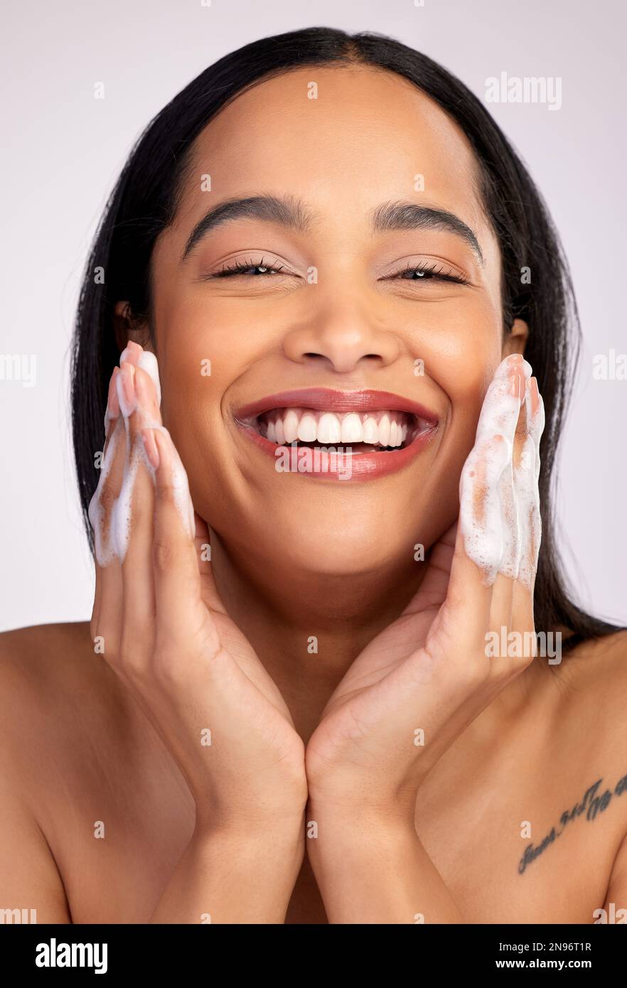 I wash my face everyday. Studio portrait of an attractive young woman ...