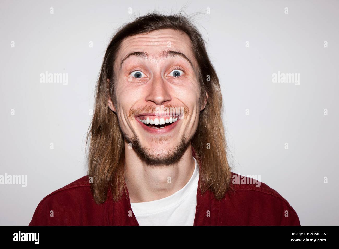 Positive astonishment. Surprised young male Stock Photo - Alamy
