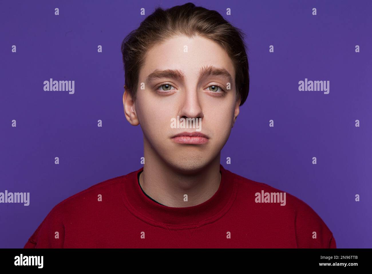 Disappointed young man. Dissatisfaction emotion Stock Photo - Alamy