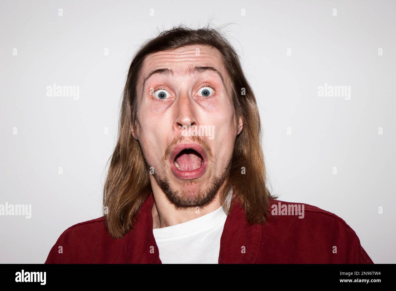 Astonished open-mouthed male. Emotion background Stock Photo - Alamy