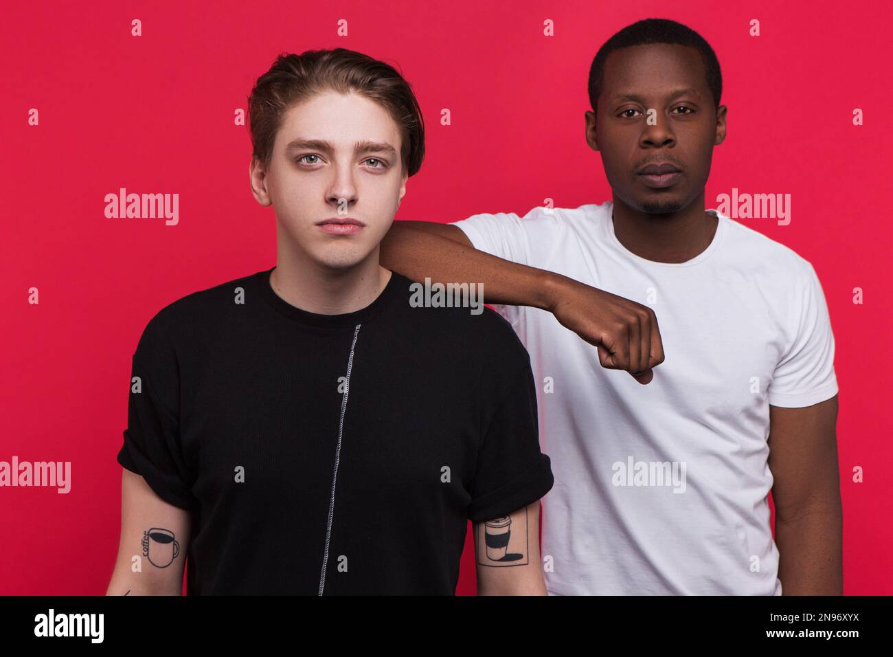 Interracial friendship. Two friends together Stock Photo - Alamy