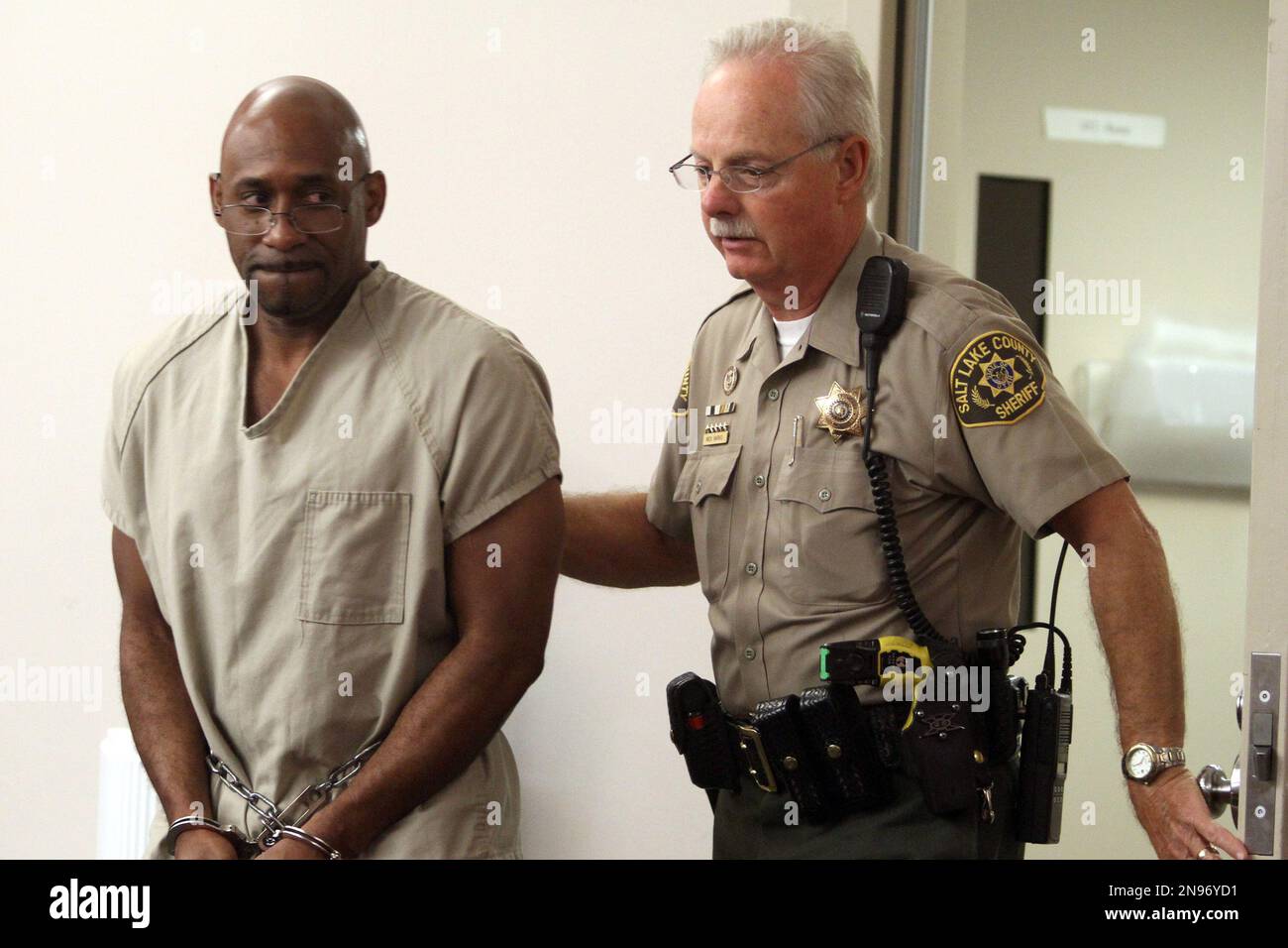 Thomas Pennington is lead into Judge Robin Reese's courtroom, for his ...