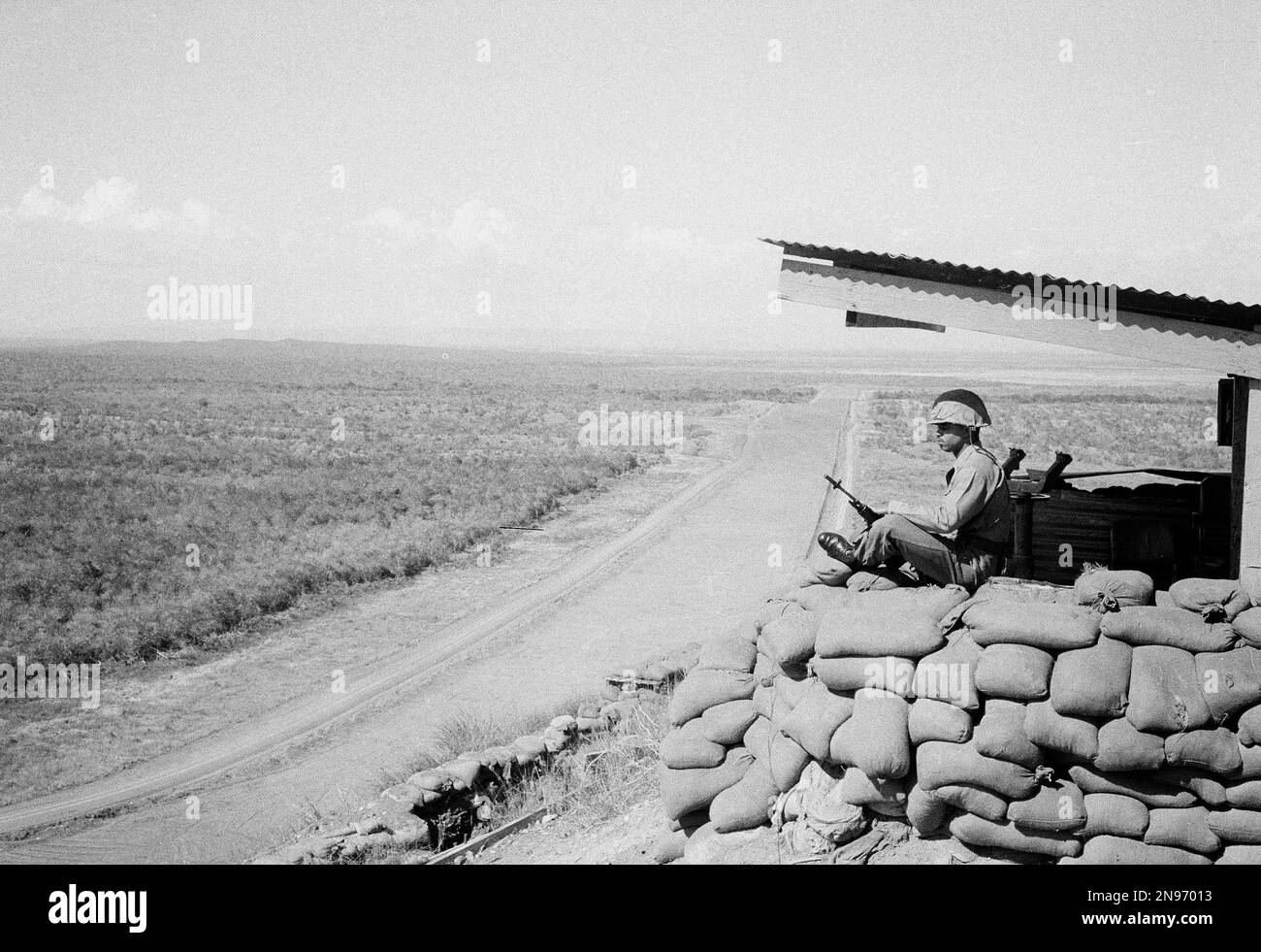 Marine Cpl. Patrick Lauder of Hackensack, N.J., scans area beyond ...