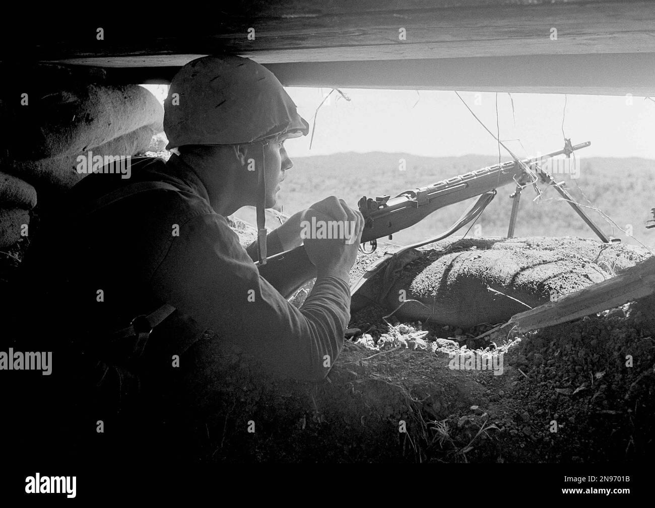 Pfc. Michael J. Riley of Watertown, N.Y., keeps his eyes sweeping Cuban ...