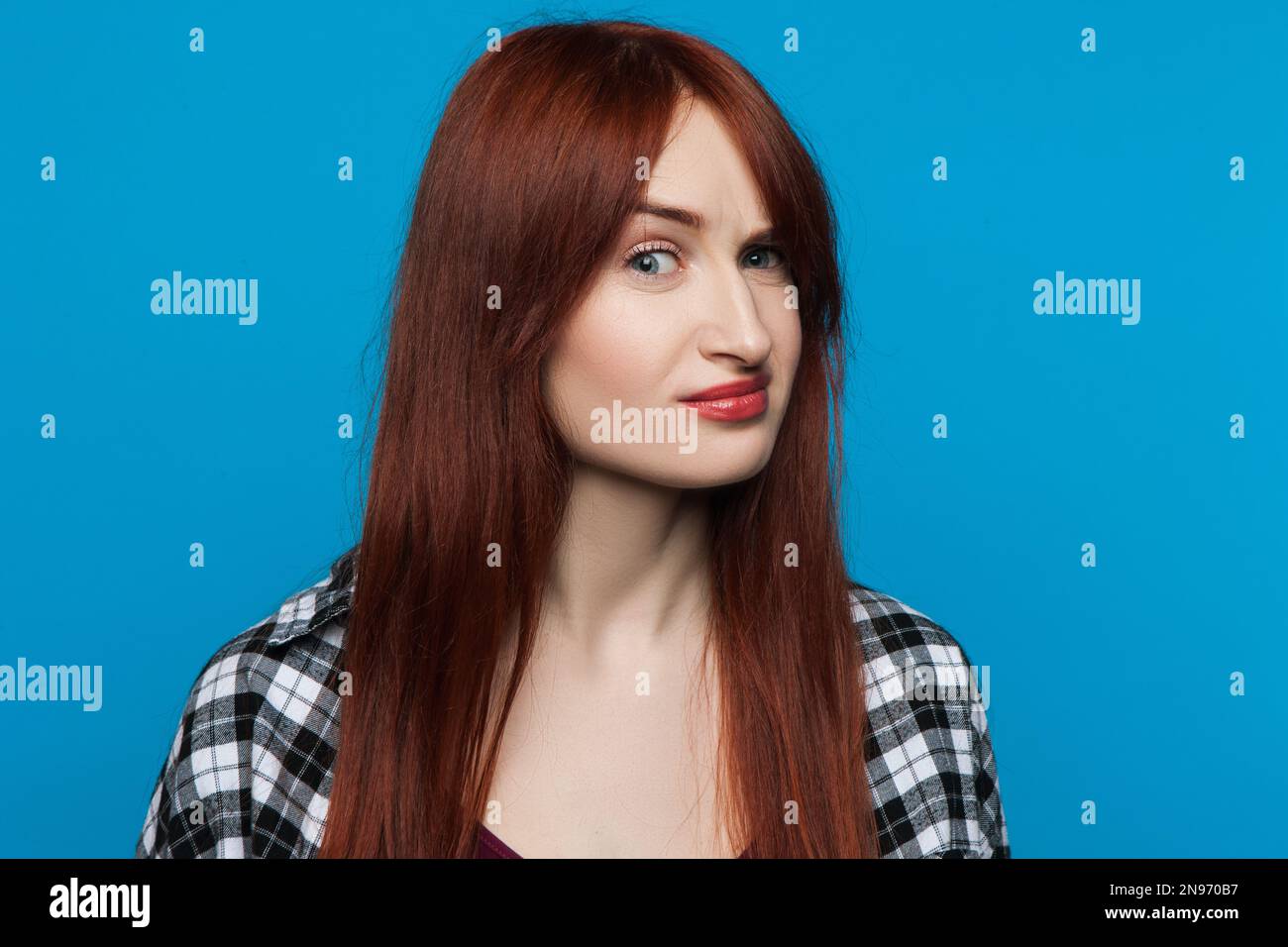 Doubtful looking girl. Silent question Stock Photo - Alamy