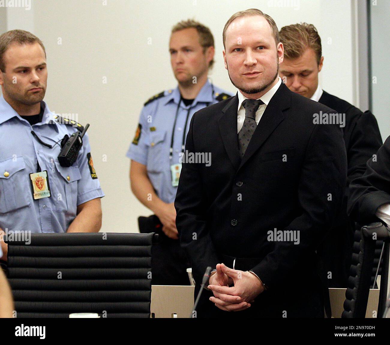 Mass murderer Anders Behring Breivik, arrives at the courtroom in a ...