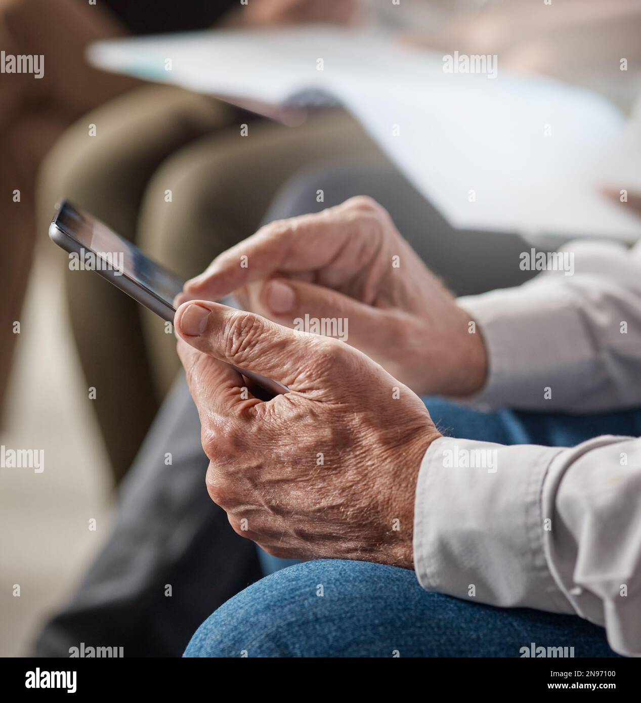 Just a tap of a finger. an unrecognizable businessperson using a phone ...