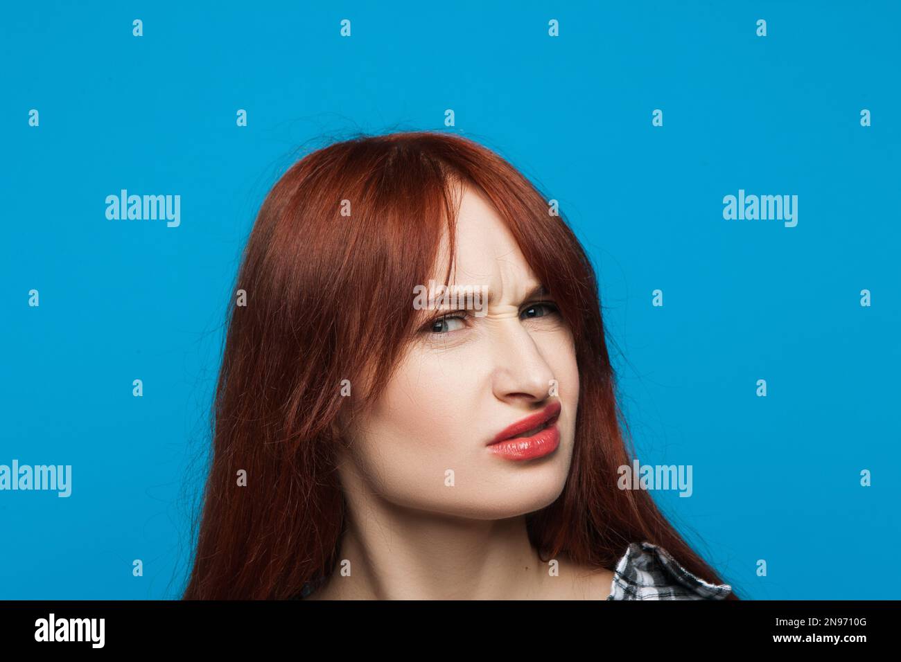 Confused girl portrait. Distrustful woman Stock Photo - Alamy