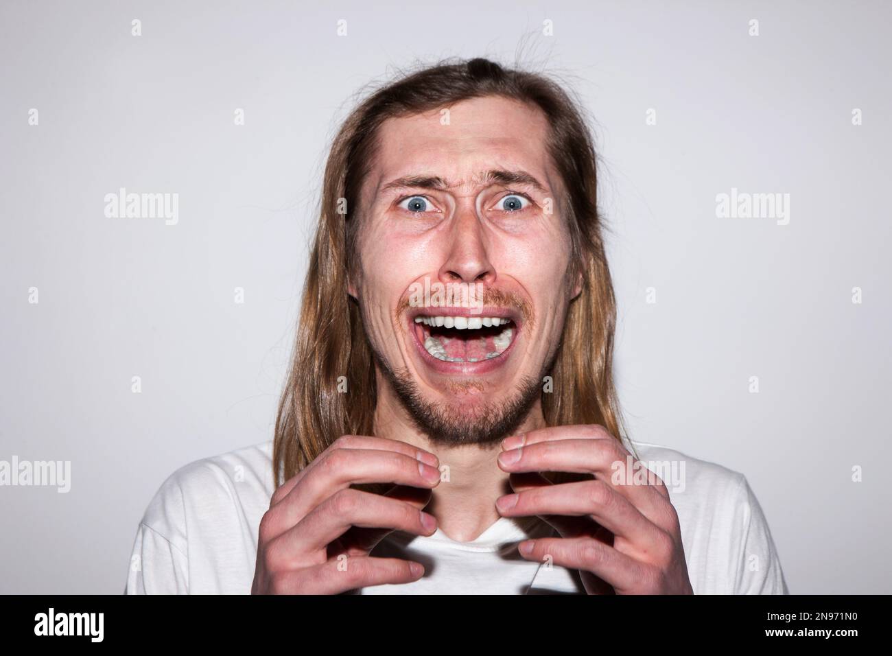 Frightened man. Emotion of fear Stock Photo - Alamy
